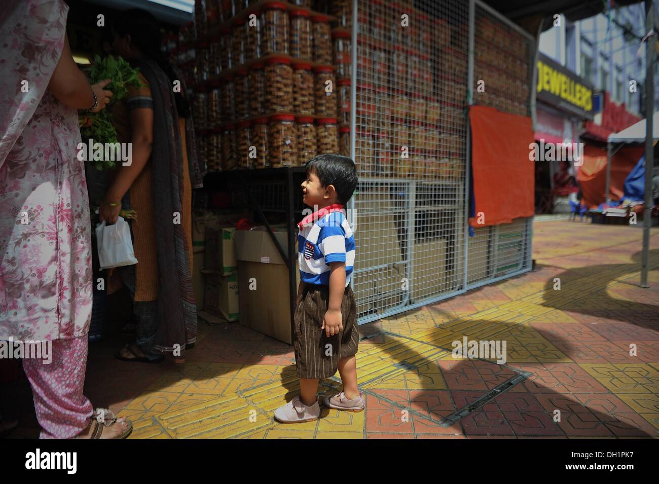 Kuala Lumpur, MALAYSIA, . 29th Oct, 2013. A young boy cry as he waiting ...