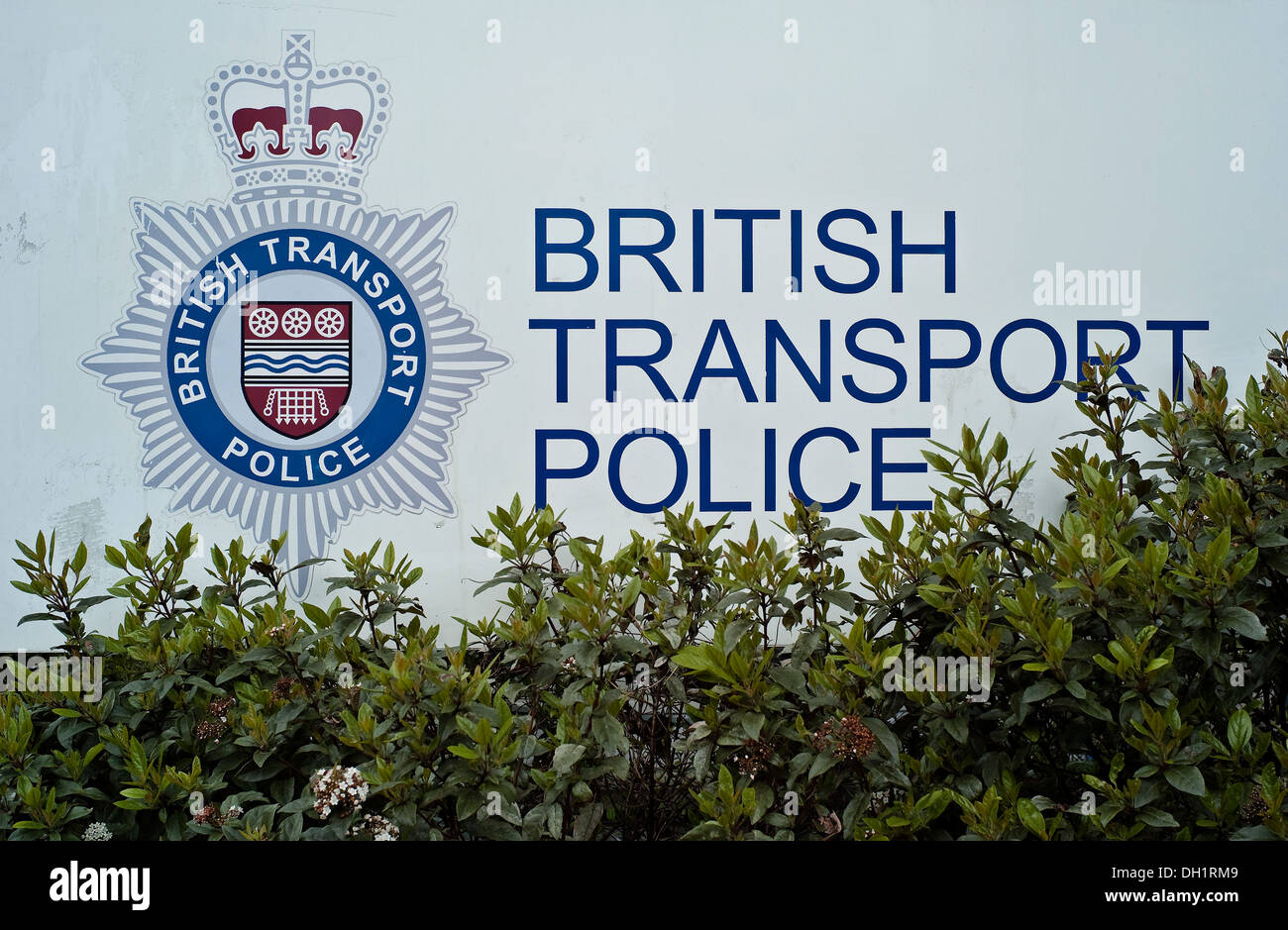 British Transport Police sign behind hedge Camden Town London Stock ...