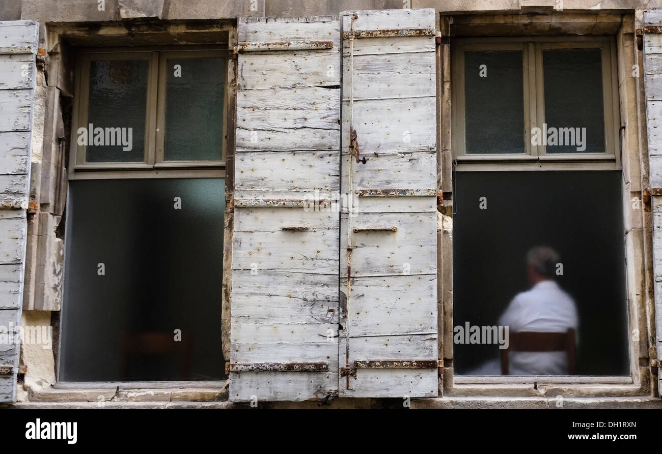 Man in Window Stock Photo - Alamy