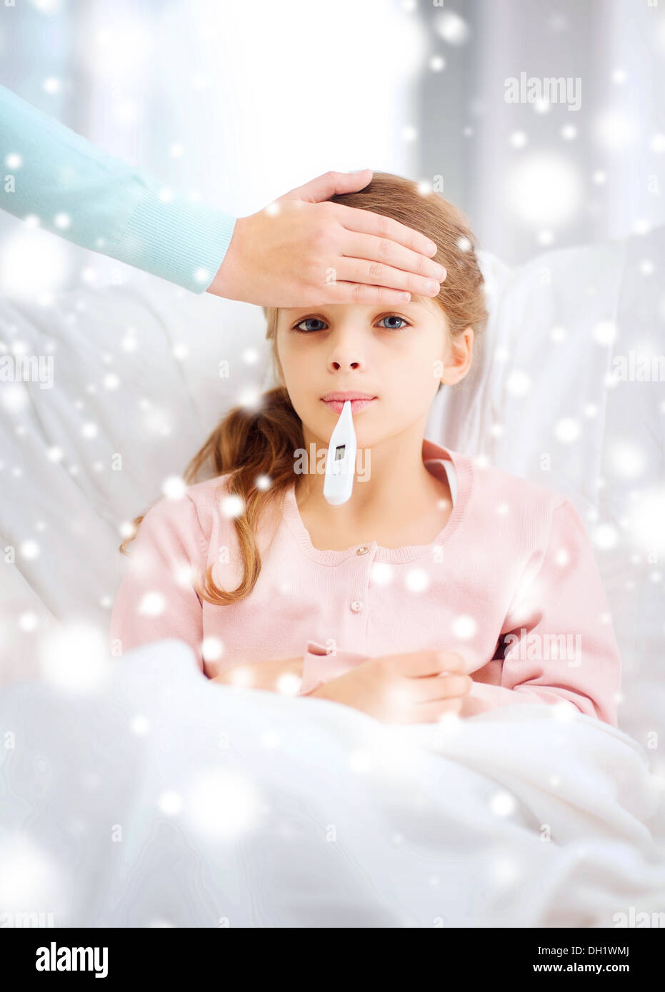 ill girl child with thermometer and caring mother Stock Photo - Alamy