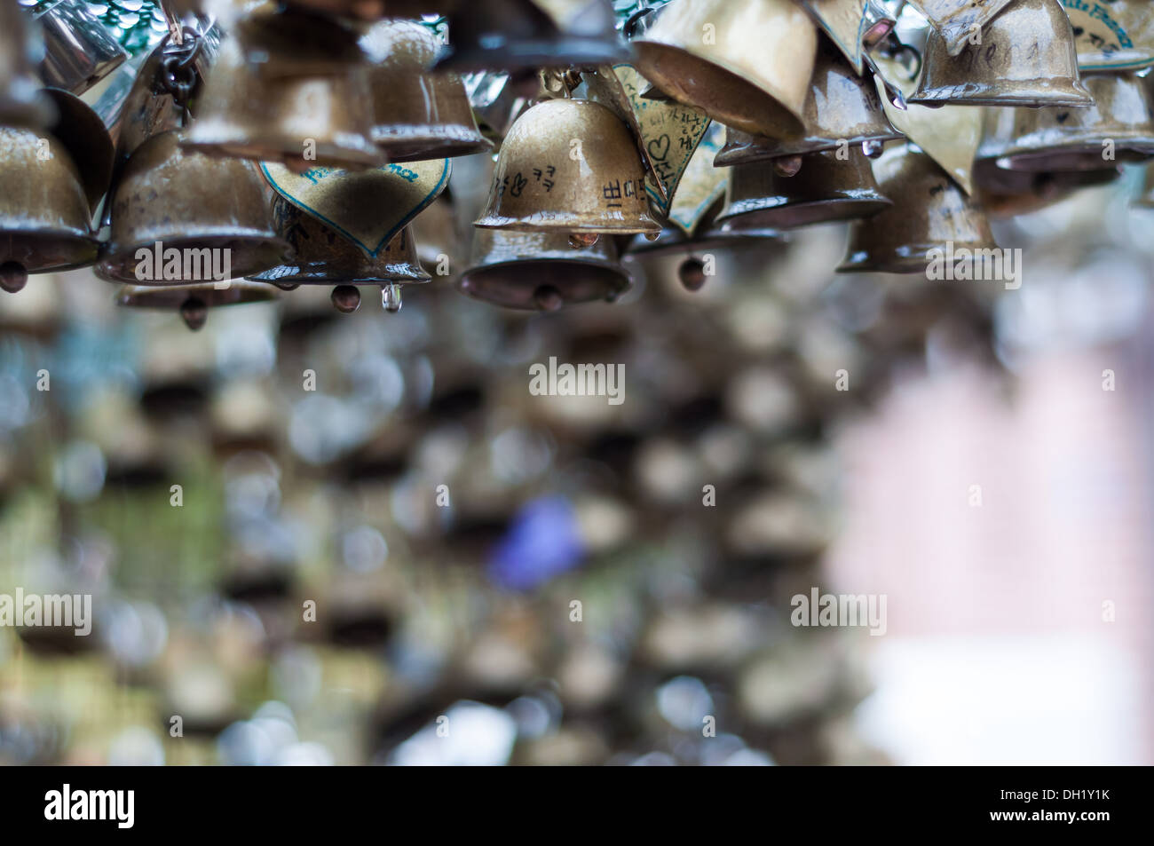 Bells hanging in the rain Stock Photo - Alamy