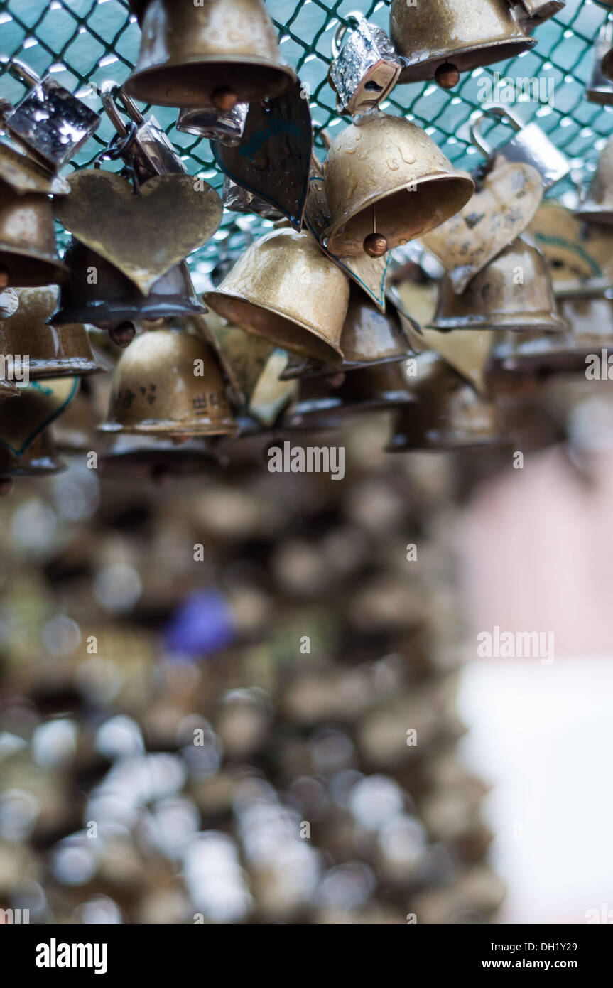 Bells hanging in the rain Stock Photo - Alamy