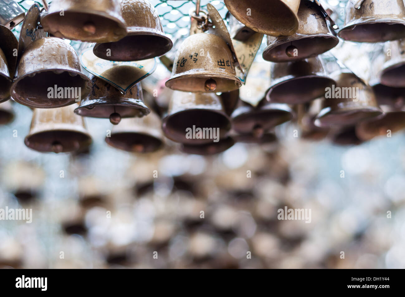 Bells hanging in the rain Stock Photo - Alamy