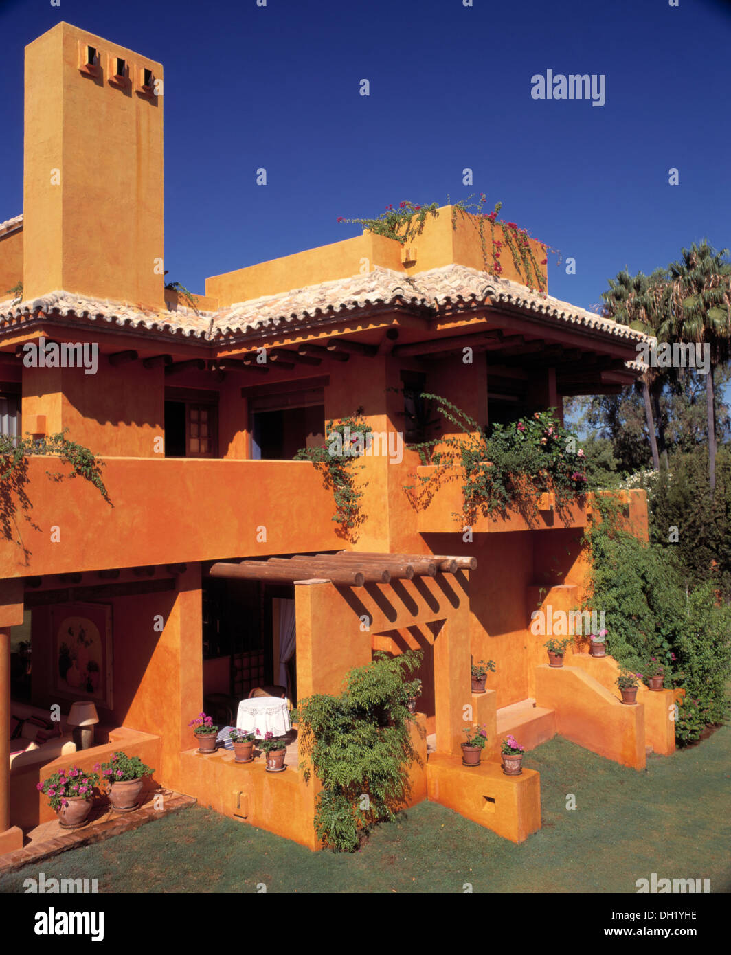 Large modern Spanish villa with terracotta sponging effect walls and ...