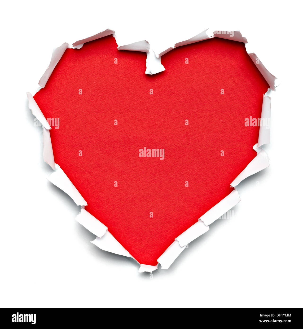 close up of a ripped paper hole heart shaped on white background Stock ...