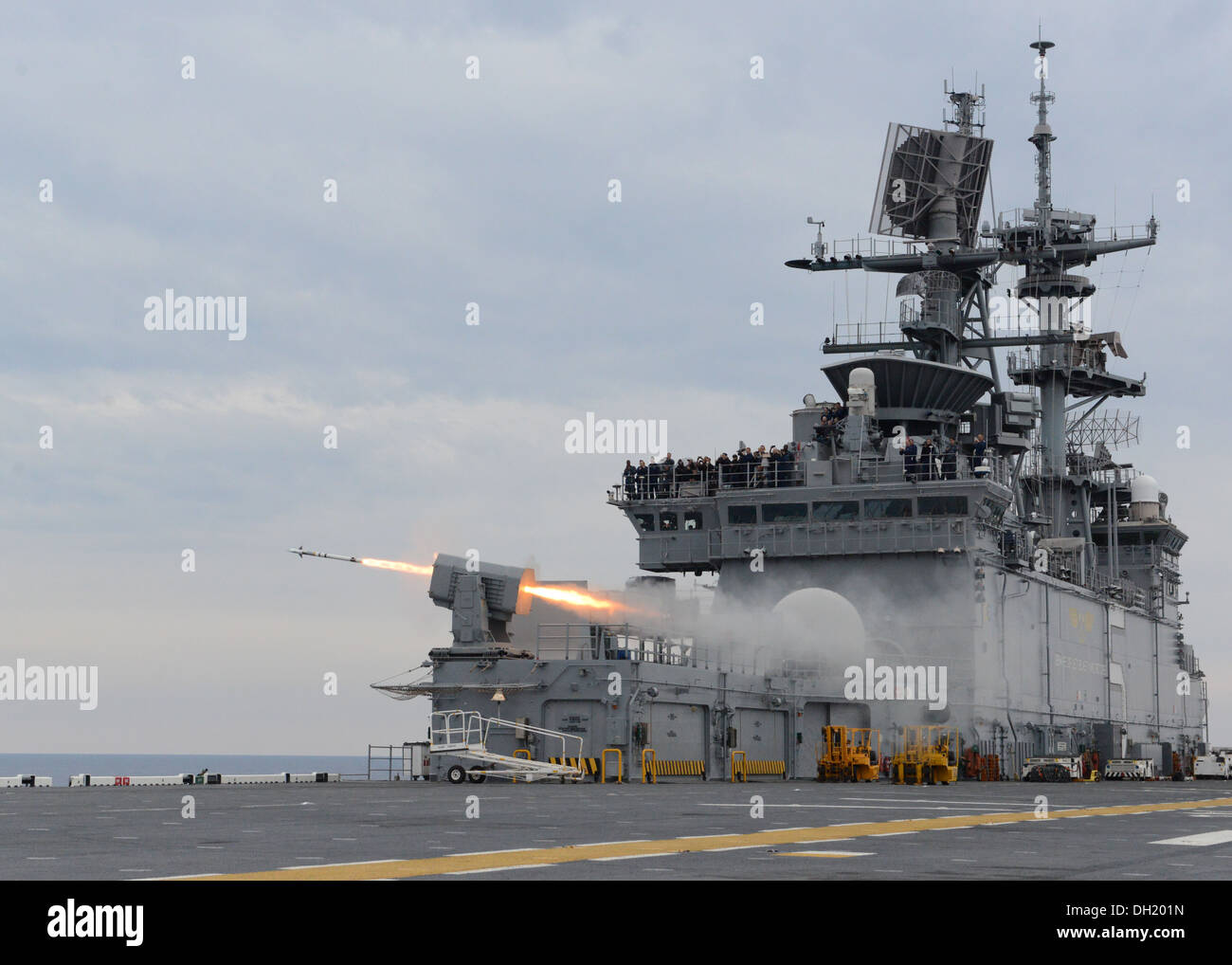 USS Bataan sailors fire a RIM-116 Rolling Airframe Missile (RAM). The ...