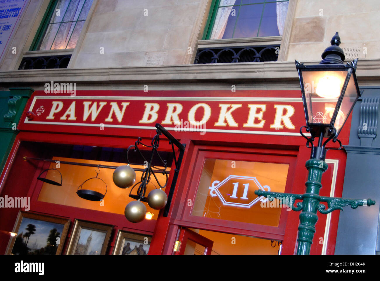 Pawn Brokers shop front in cobbled street. Early 1900's Stock Photo - Alamy