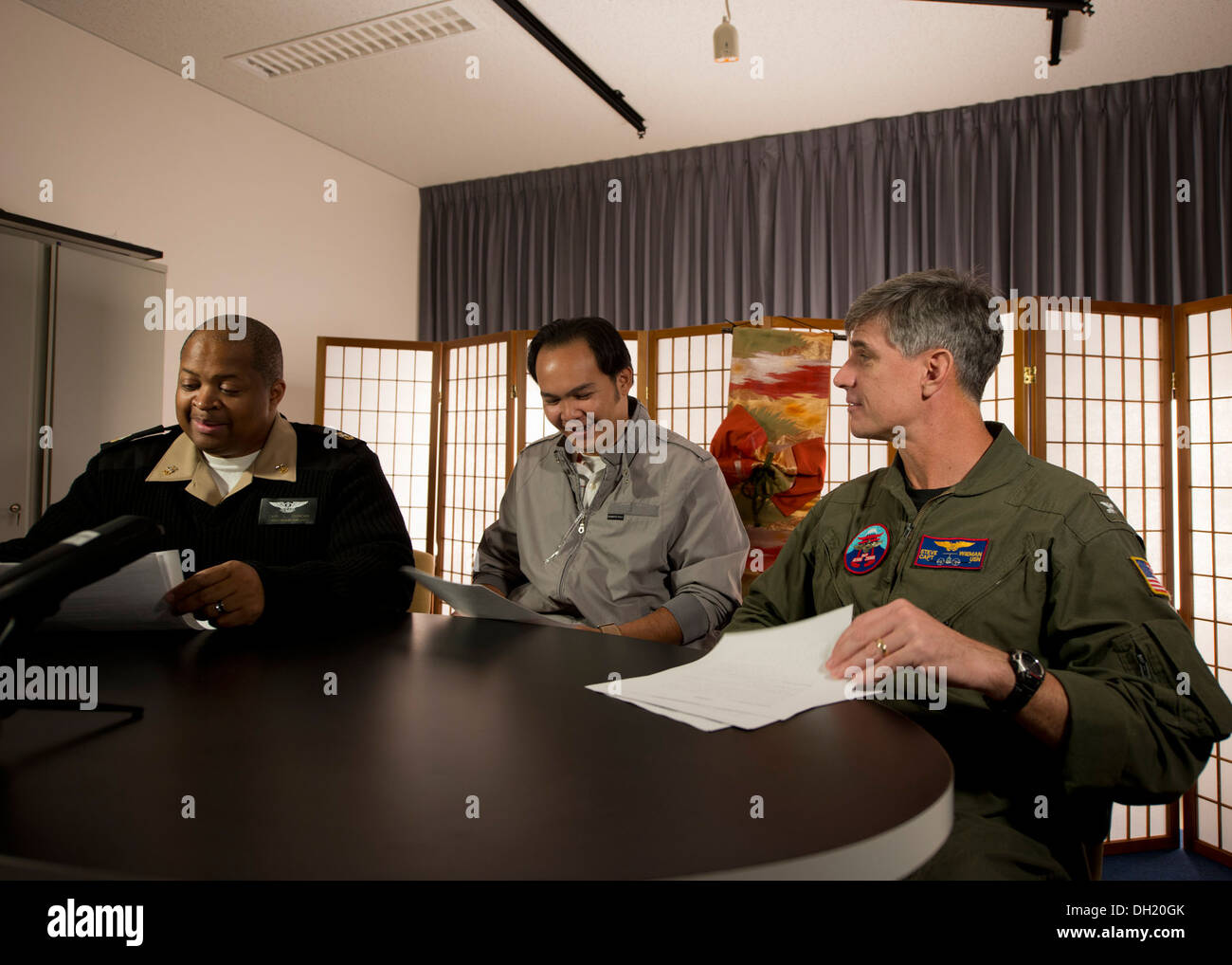 Naval Air Facility Atsugi commanding officer Capt. Steven Wieman, right ...
