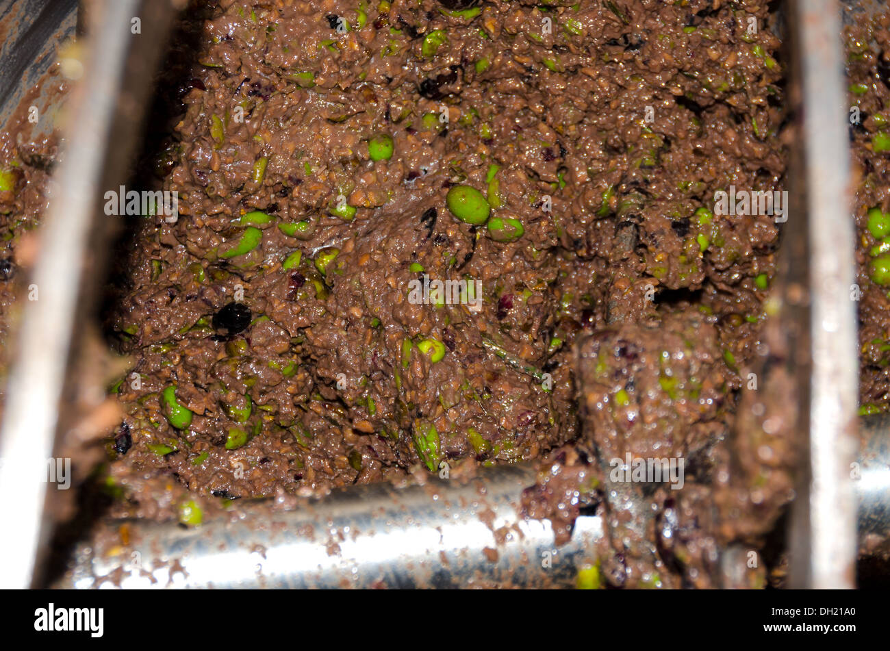Pressing olives hi-res stock photography and images - Alamy