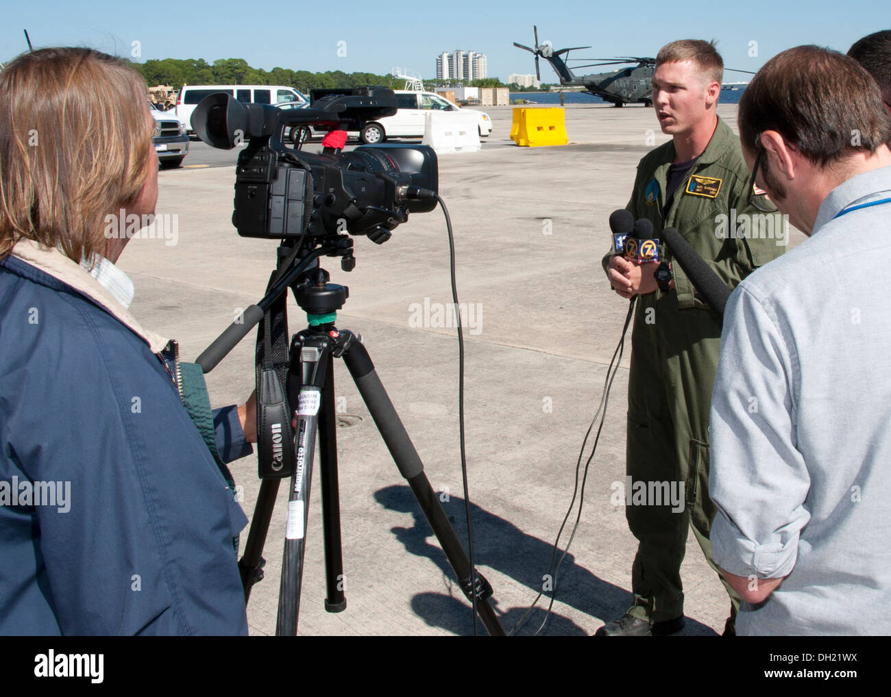 Petty Officer 1st Class Nathan Gardner, of Hesperia, Calif., responds ...