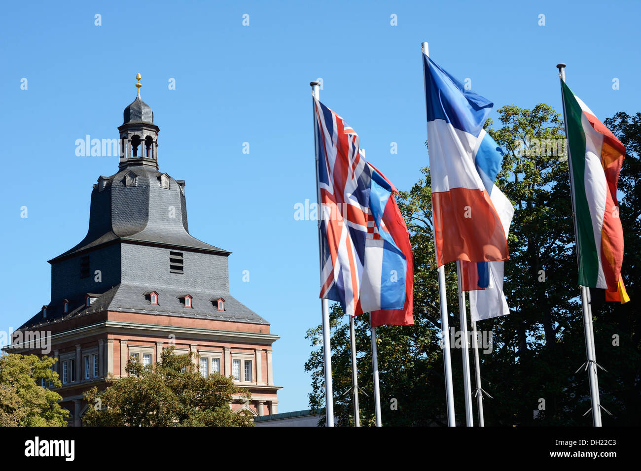 Flags in front of a historic tower in Trier (Rhineland-Palatinate ...