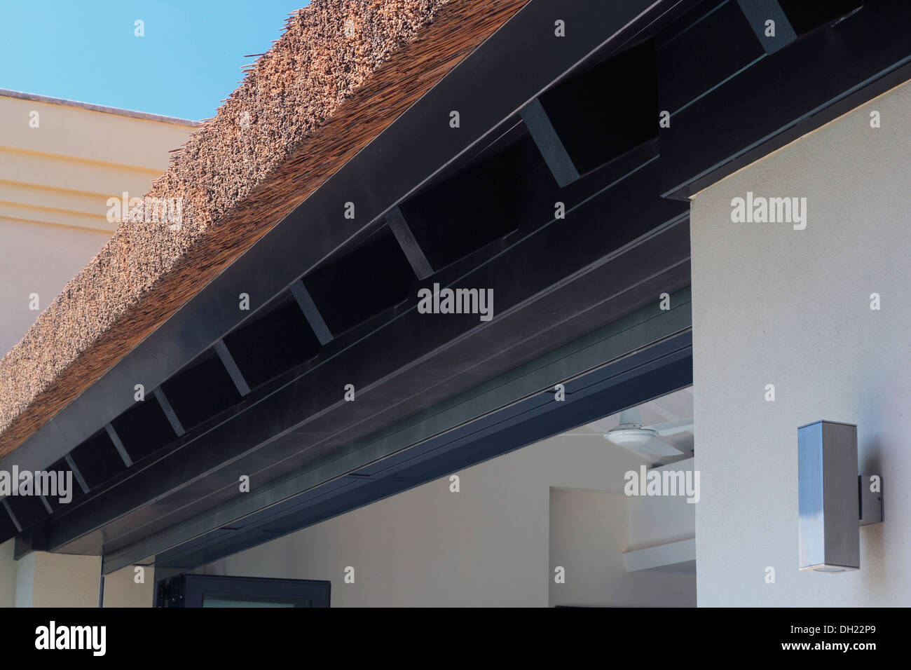 Close-up of eaves and thatched roof on newly built villa in Spain Stock ...