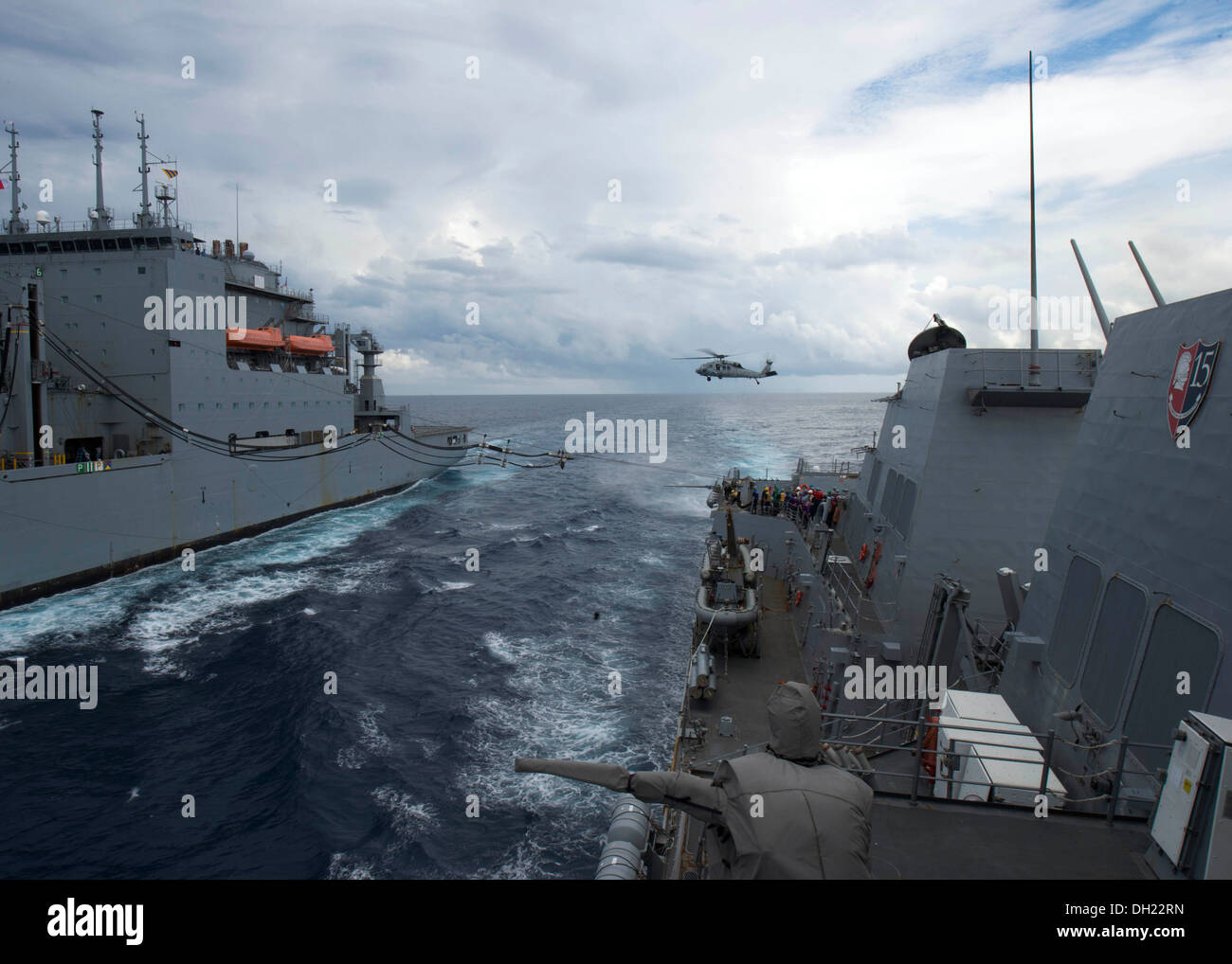 SOUTH CHINA SEA (Oct. 23, 2013) The guided-missile destroyer USS Mustin ...