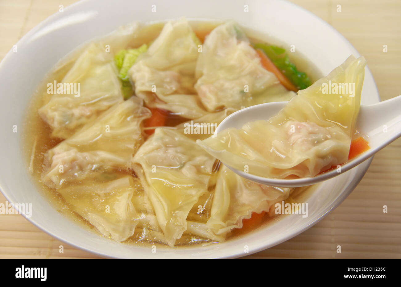 Spoon with wonton hi-res stock photography and images - Alamy