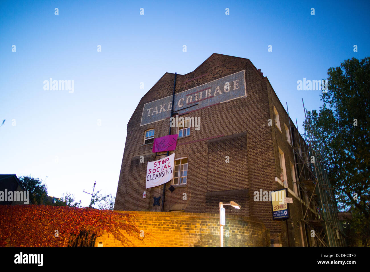 Protest banners hang from the occupied house in Park Street, SE1. The ...
