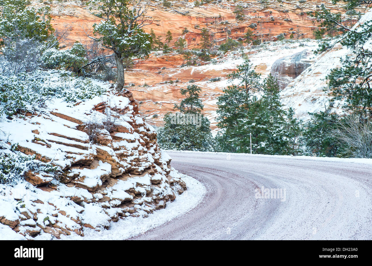 Landscape with a curved icy road Stock Photo - Alamy