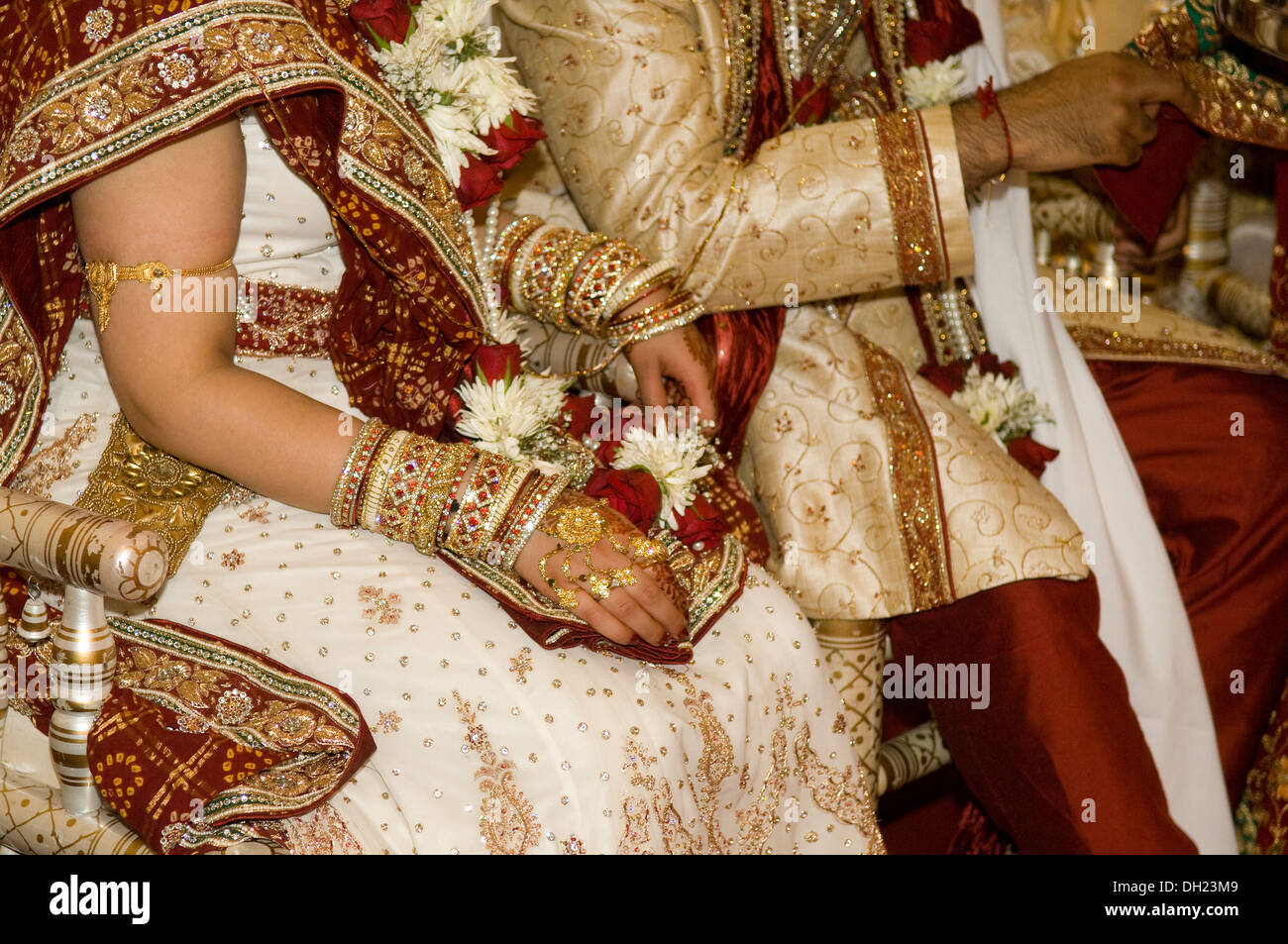 Bride and Groom dressed in all their finery celebrating their ...