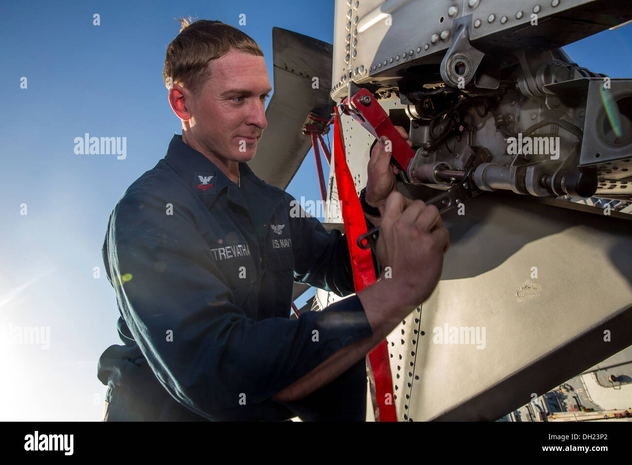 Aviation Machinist's Mate 3rd Class Mark Trevathan performs routine ...