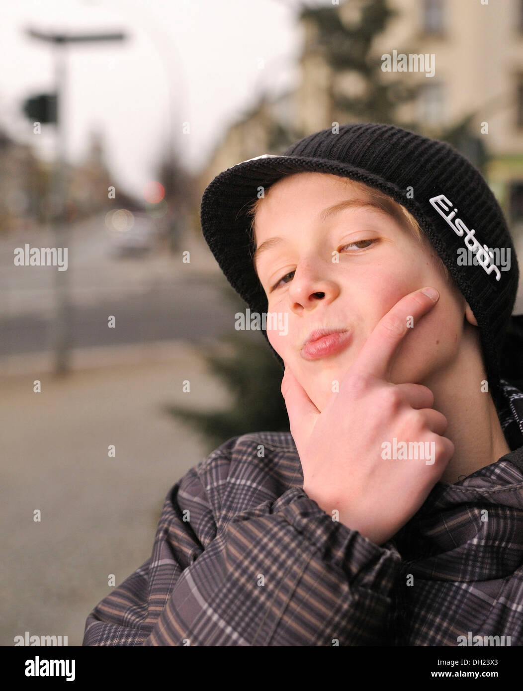 Boy, 12 or 13 years, trying to look cool, portrait Stock Photo - Alamy