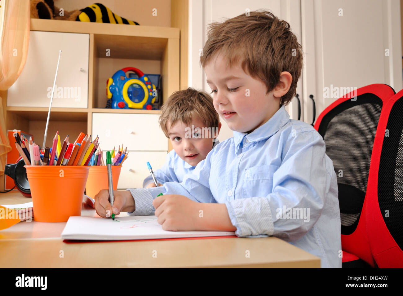 Boys Drawing Crayons High Resolution Stock Photography and Images - Alamy