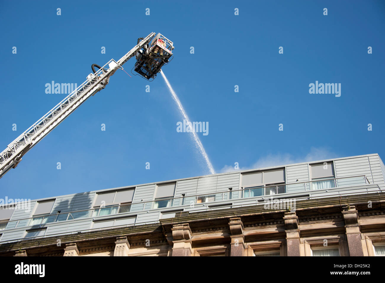 Fire Hydraulic Platform Water Tower Roof fire flames smoke Stock Photo ...
