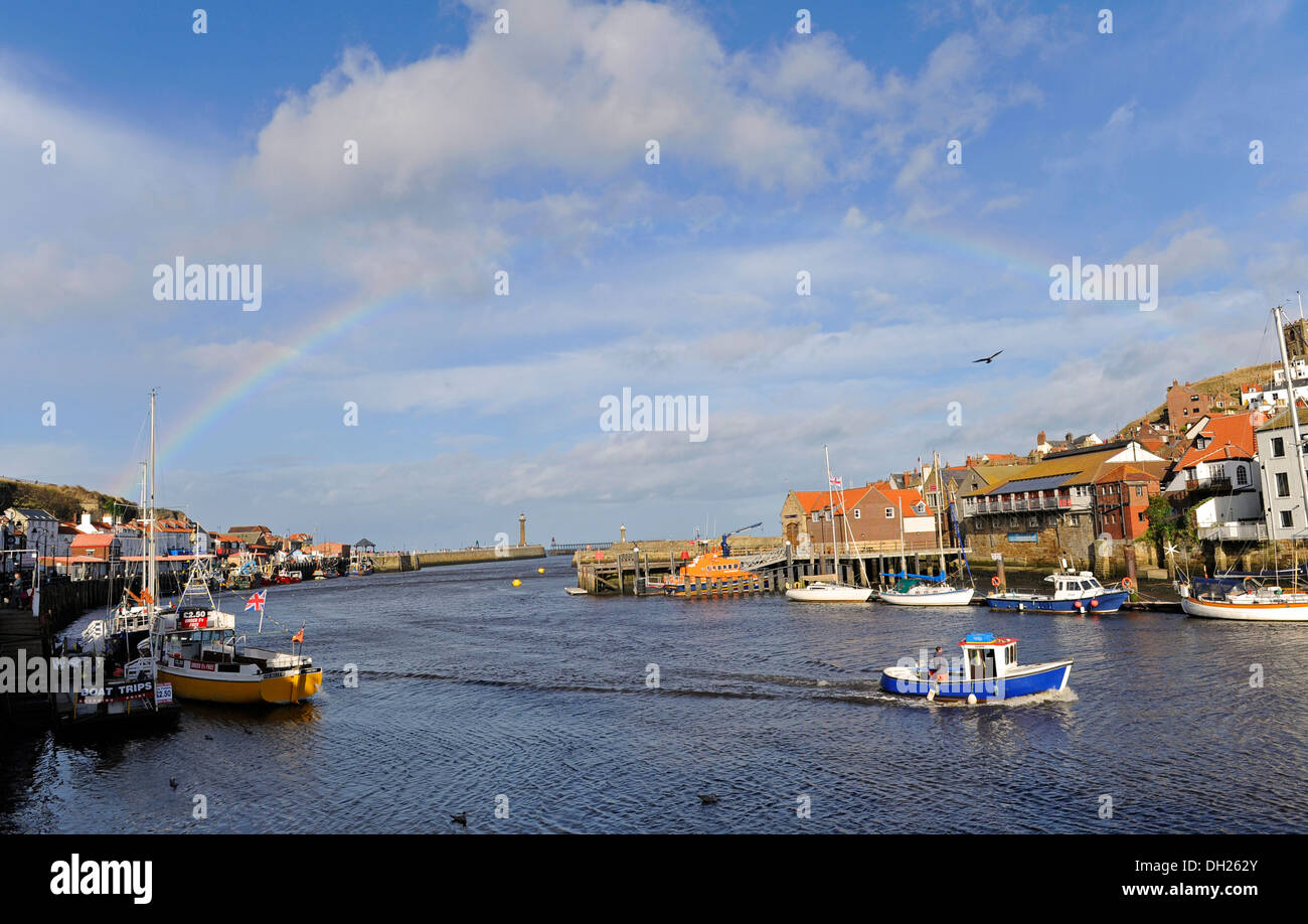 Rainbow over the harbour at the fishing village of Whitby, North ...