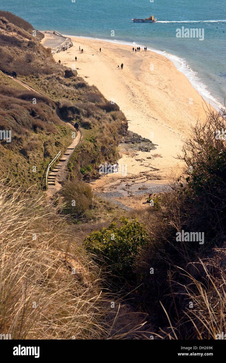 Beach and coastal path at rock beach with Padstow ferry in background ...