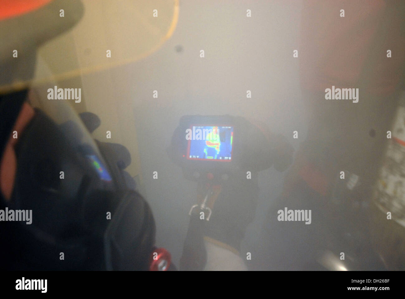 Chief Petty Officer Robin Yoder, a member of USCG Cutter Hollyhock's ...