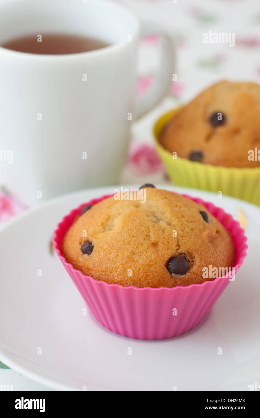 Two muffins and cup of tea Stock Photo - Alamy