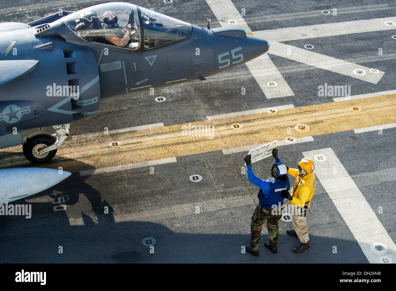 AV-8B Harrier pilot prepares to take off of the multipurpose amphibious ...