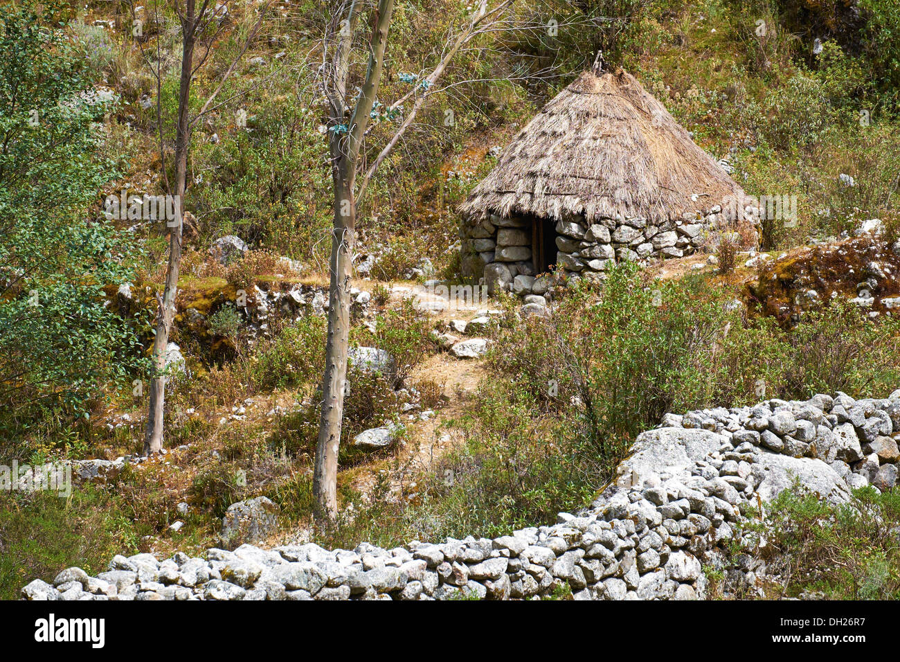 A traditional stone hut at Cojup in the Peruvian Andes, South America ...