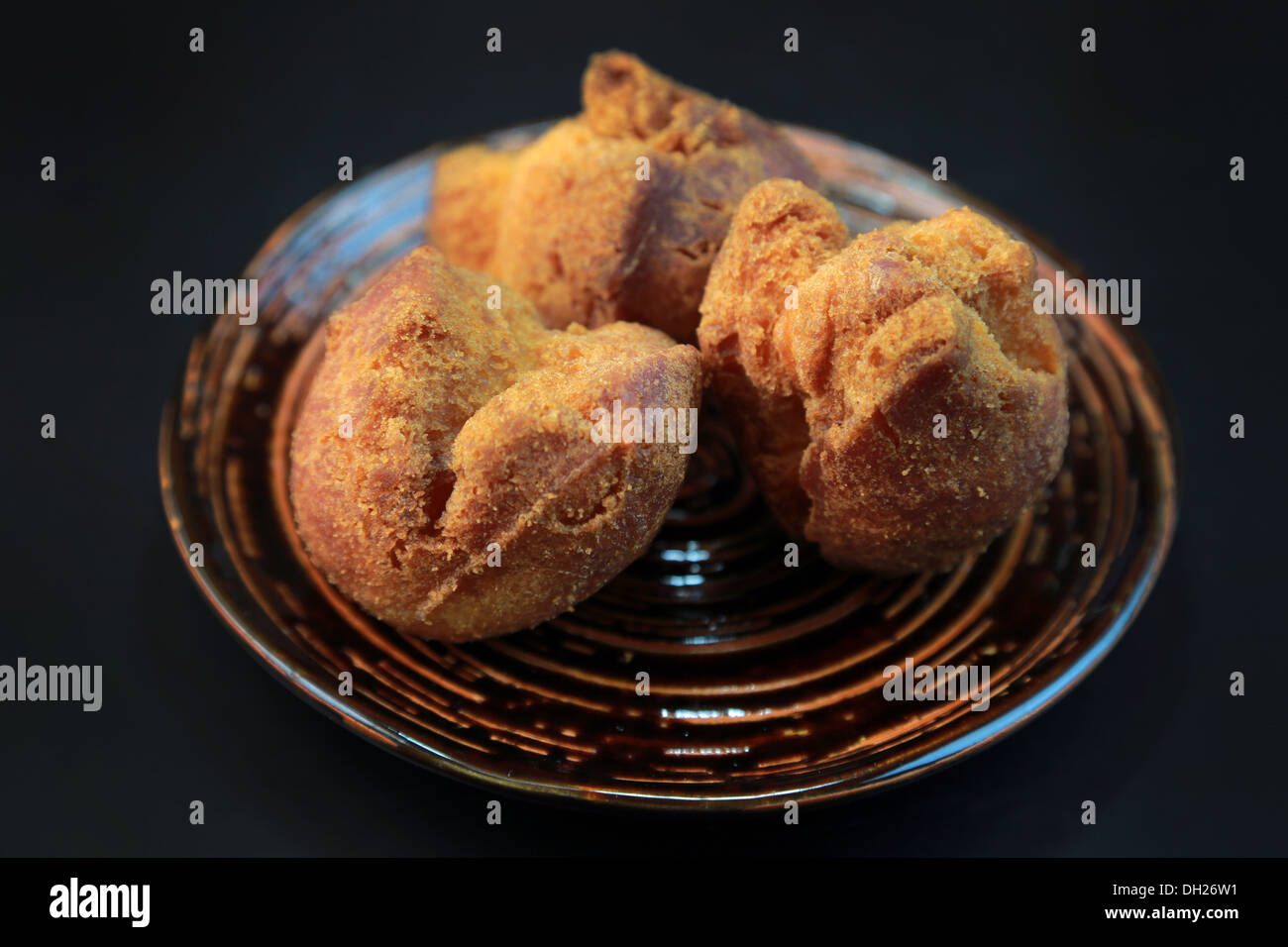 Sata andagi (Okinawan sweet deep-fried bun Stock Photo - Alamy