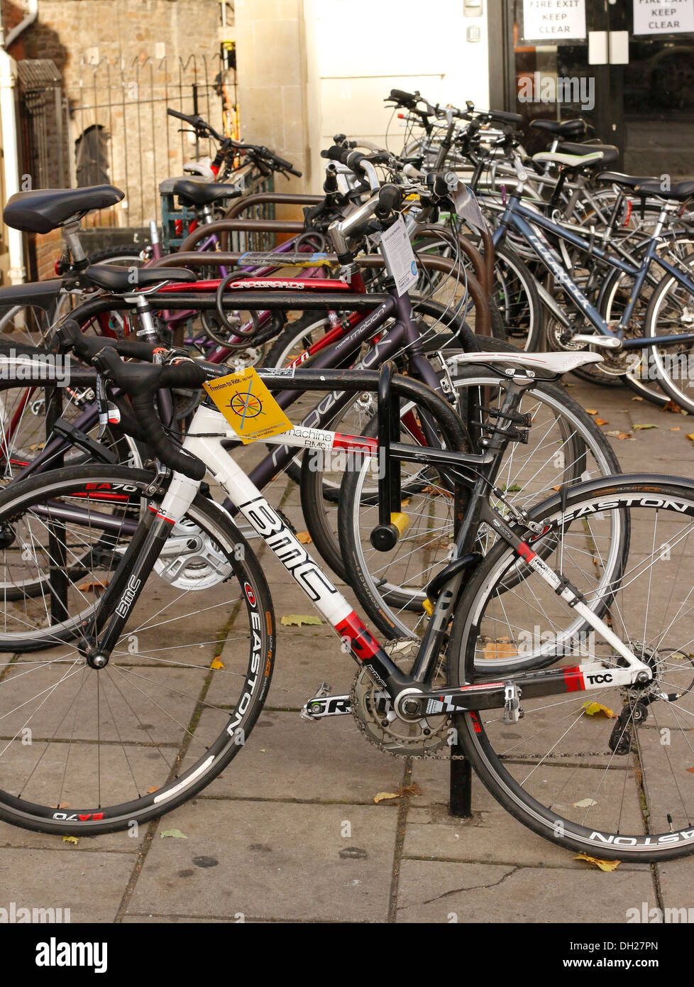 Freedom to ride cycling campaign placing note on the handlebars of a ...