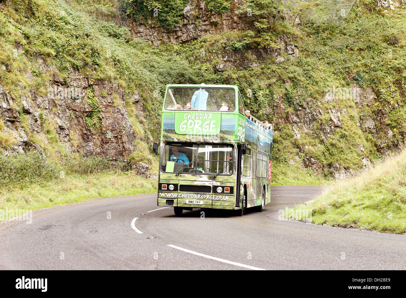 Tourist bus climbing horseshoe bend in Cheddar gorge, Somerset, October ...