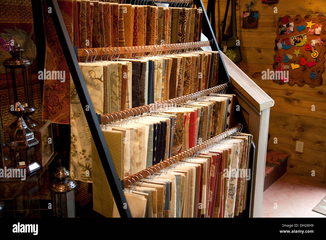 Fabric samples hanging on rack hi-res stock photography and images - Alamy