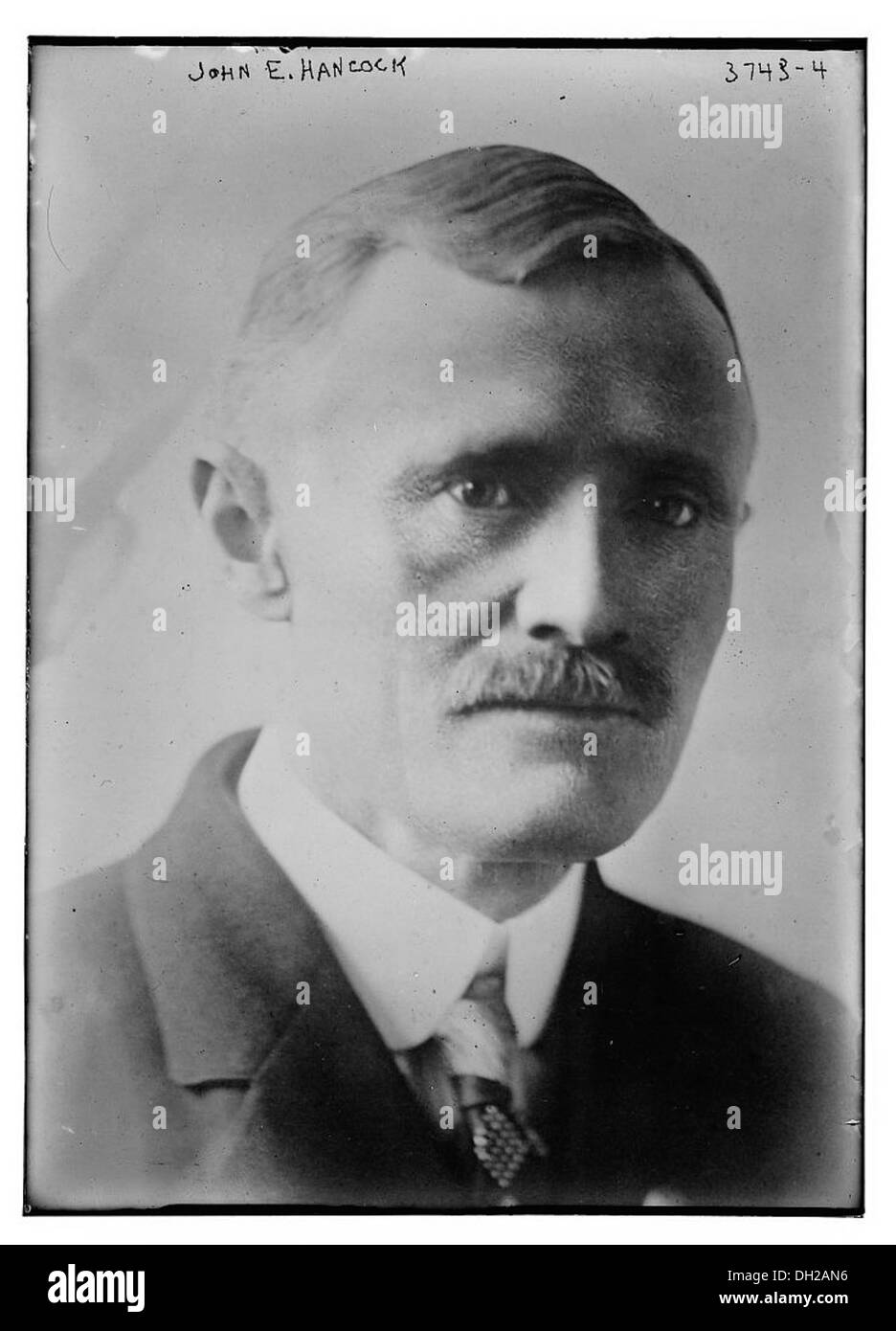 This historical portrait features John E. Hancock, capturing an ...