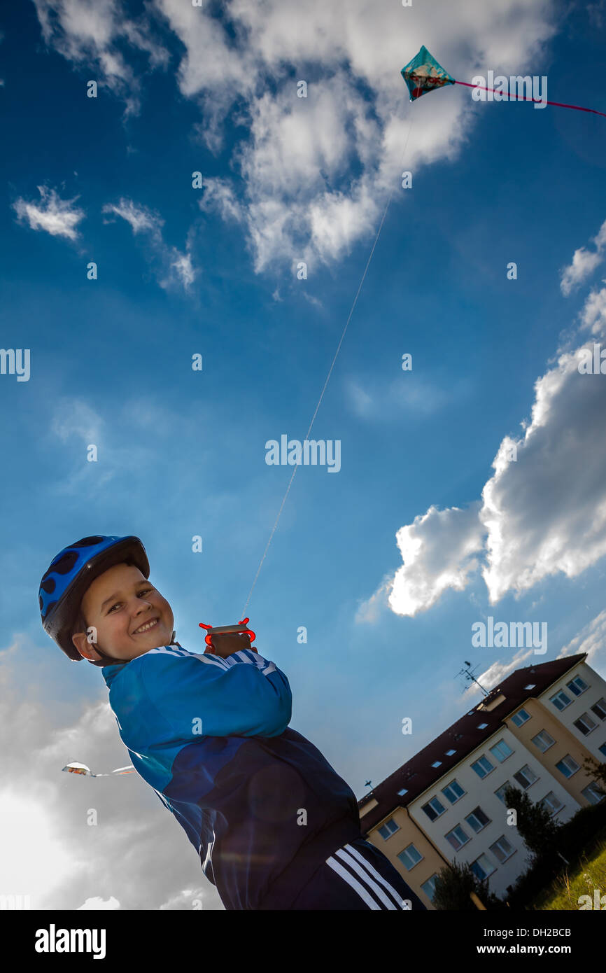 happy boy with kite from the sun Stock Photo - Alamy