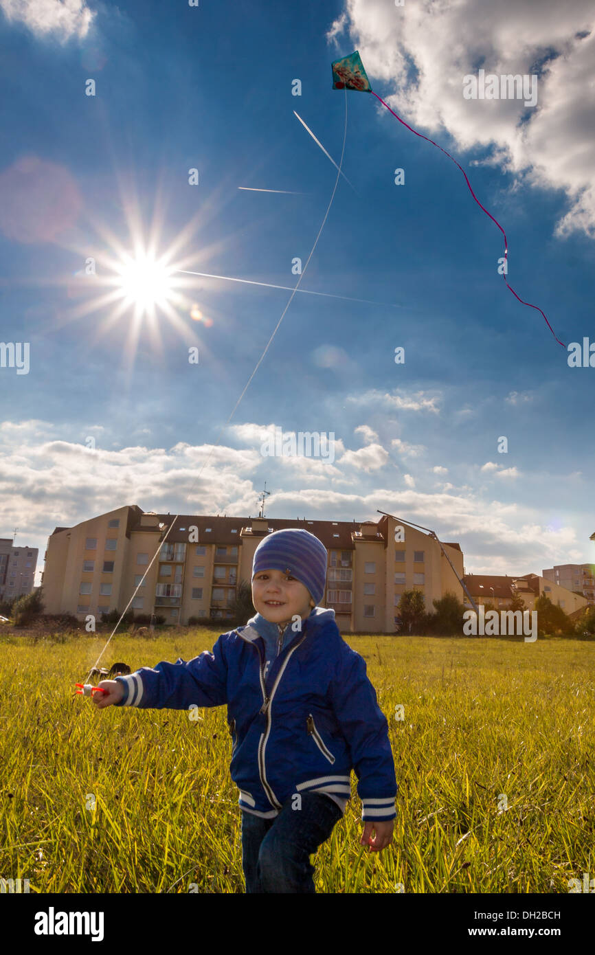 happy boy with kite from the sun Stock Photo - Alamy