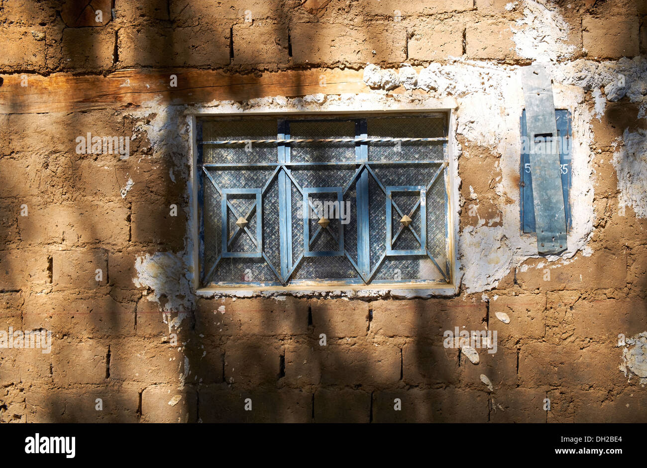An old window on an adobe building in the Peruvian Andes, South America ...