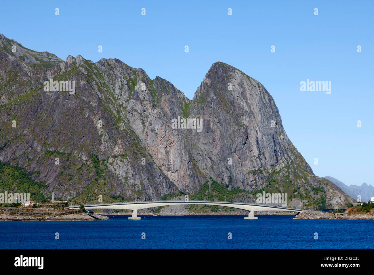 Curved bridge crossing a fjord, Reine, Moskenesøy, Lofoten, Nordland ...