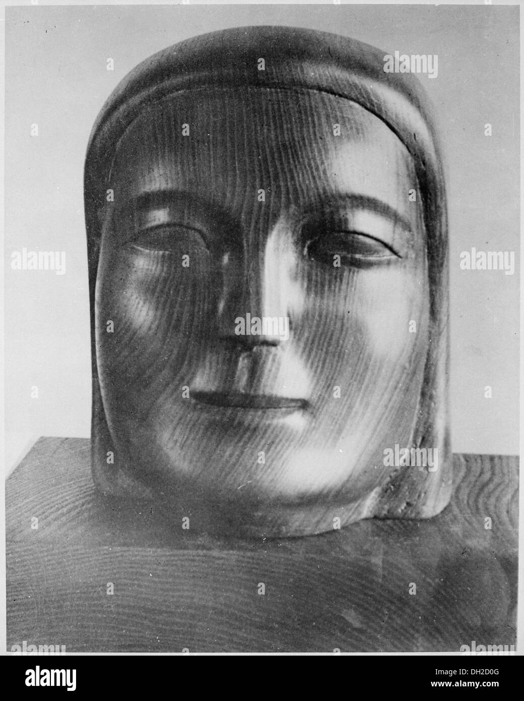 This photograph titled 'Une Tete' depicts a singular subject, possibly ...