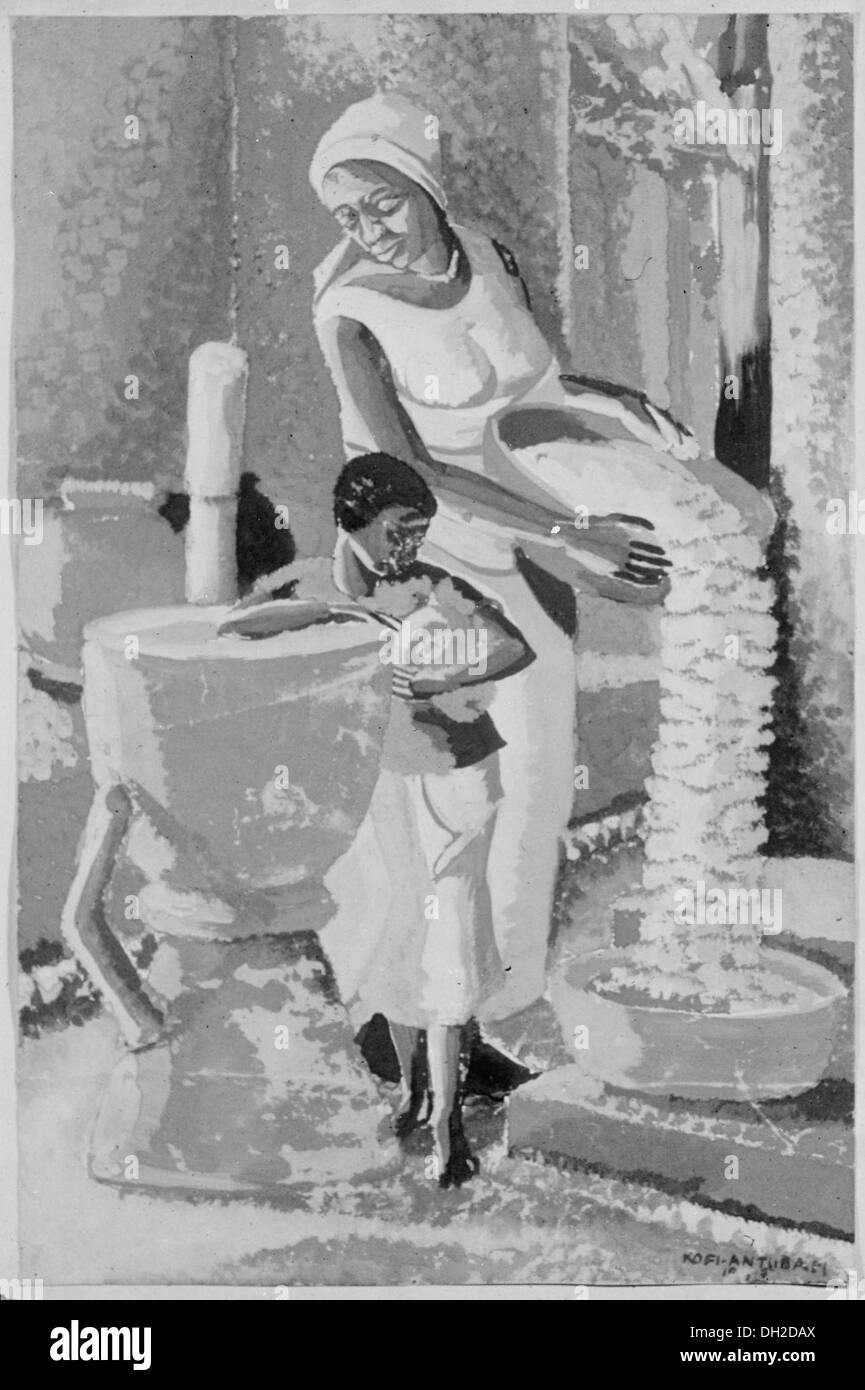 A woman grinds corn using traditional methods. The photograph captures ...