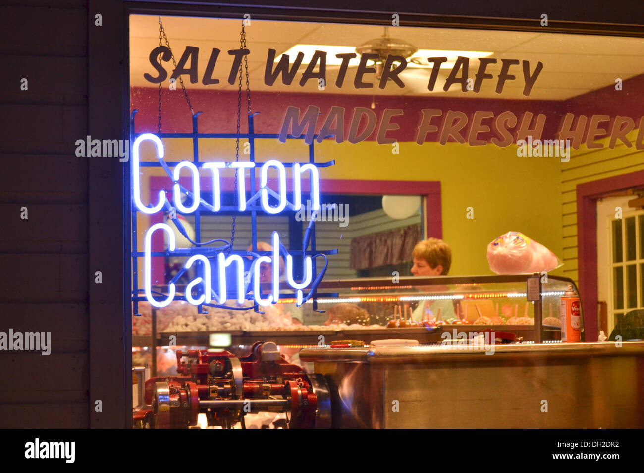 A local shop with neon signs Stock Photo - Alamy