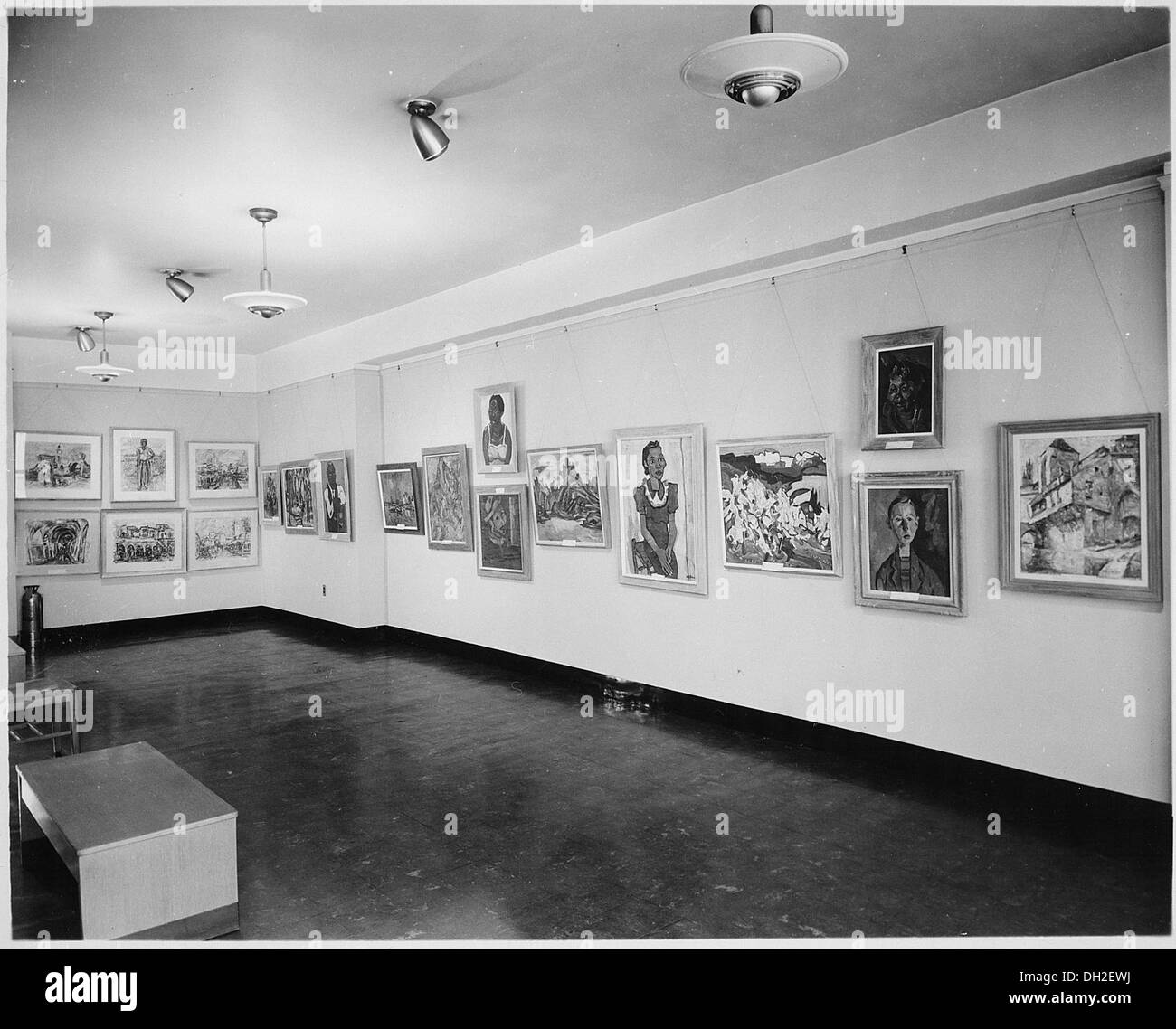 An exhibit at the Countee Cullen Library showcasing works and ...