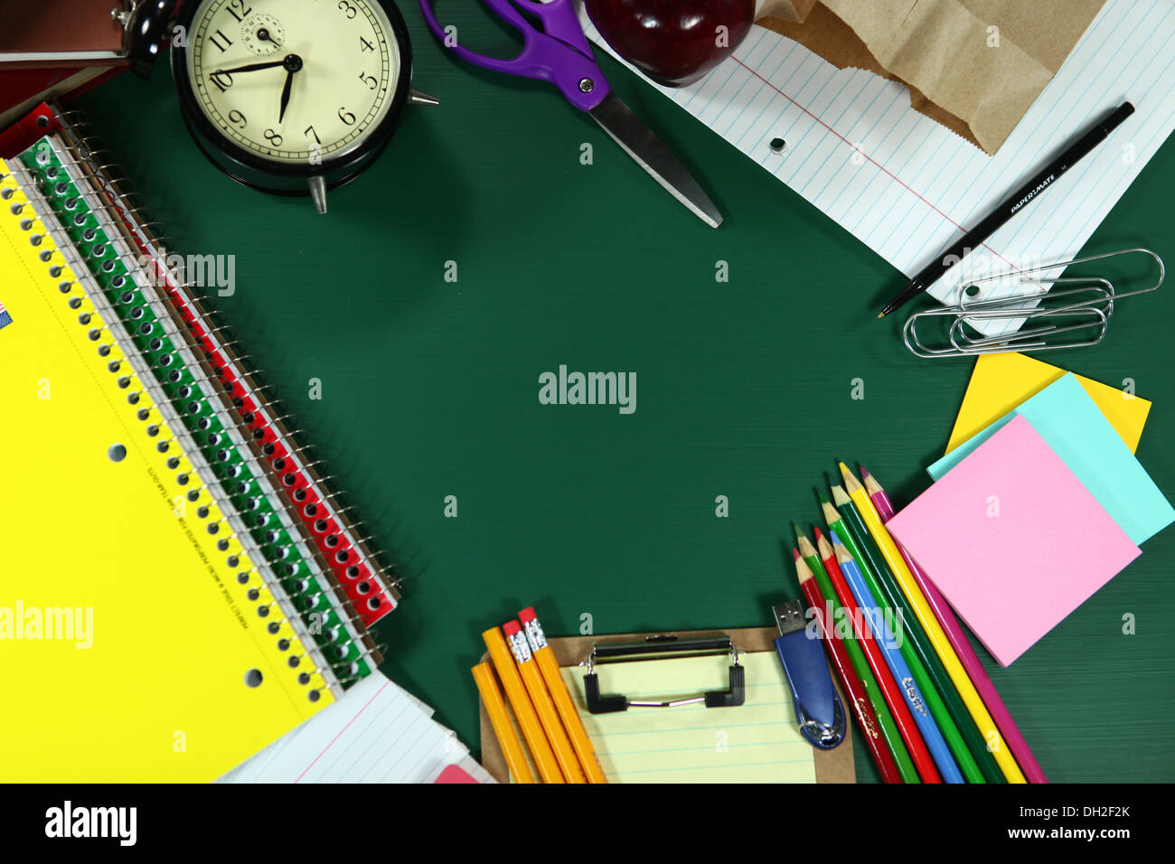 Multiple Back to School Items Arranged on a Green Blackboard Stock ...