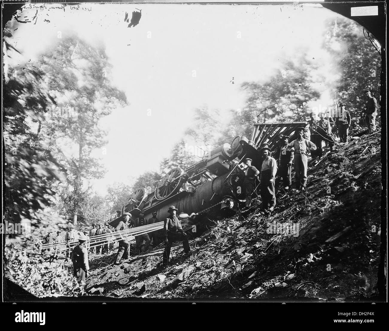 An engine has been thrown over a bank, possibly due to an accident or ...