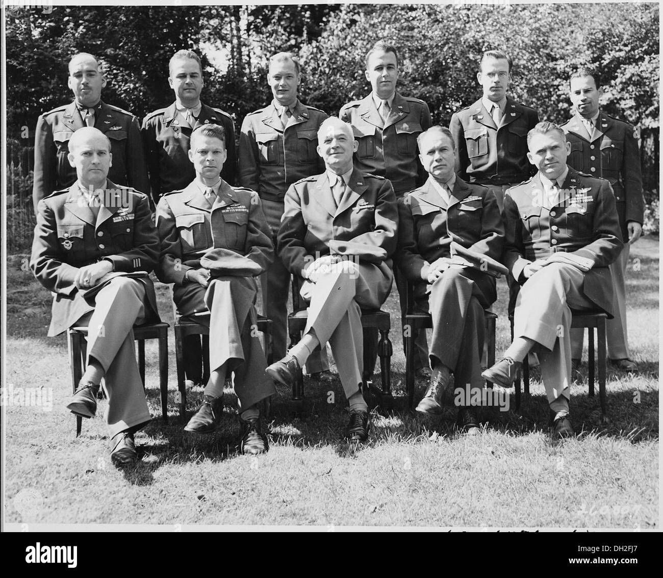General Henry Hap Arnold and his staff are pictured outdoors during the ...