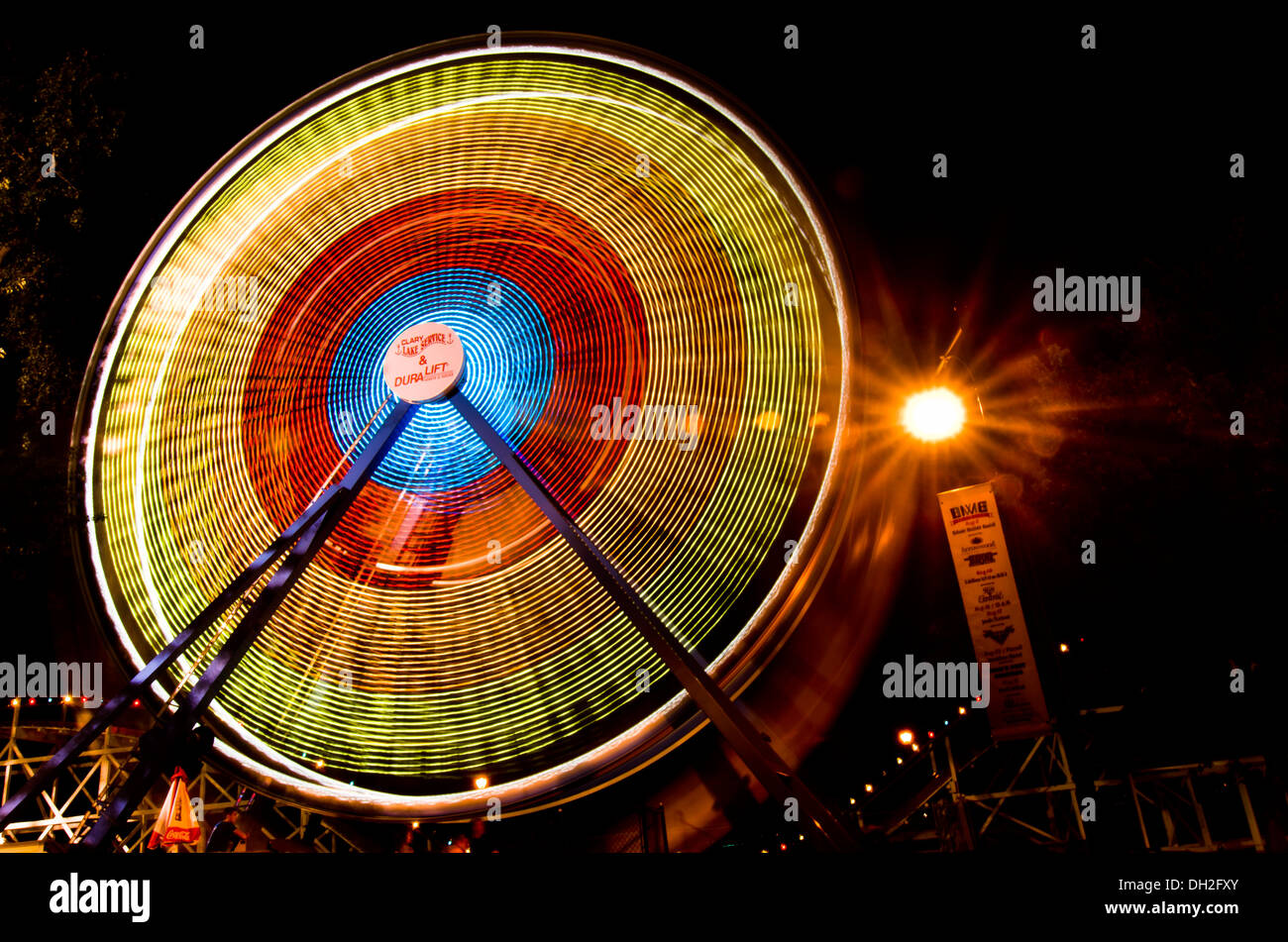 A ferris wheel moves in Okoboji at night Stock Photo - Alamy