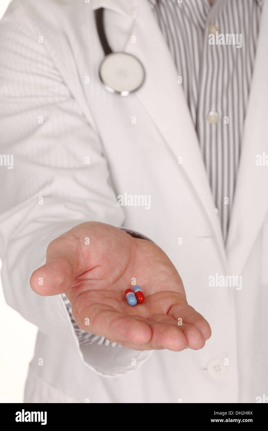 Doctor With Medication in Hand Reaching Out Stock Photo - Alamy