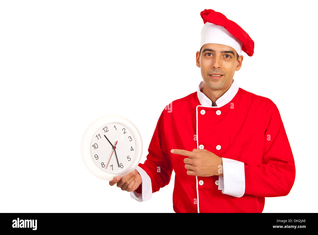 Chef male pointing to clock isolated on white background Stock Photo ...
